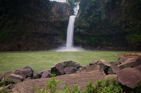 Premium Photo High Waterfall Scene Captured Using Slow Shutter Speed