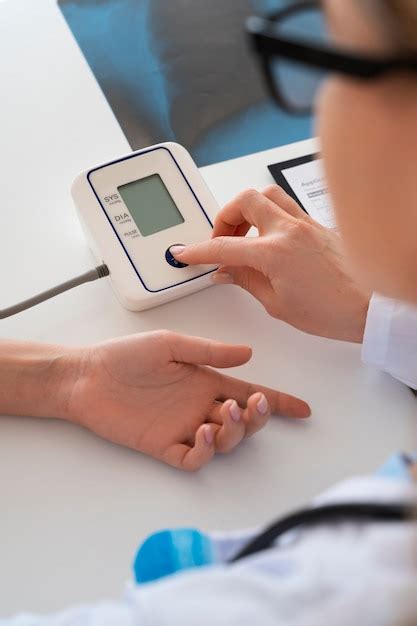 Free Photo Doctor Using Tensiometer High Angle