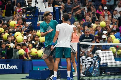 Novak Djokovic Of Serbia And Alexander Zverev Of Germany Embrace After