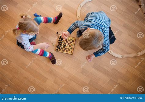 Brother And Sister Playing With Chess Stock Image Image Of Leisure