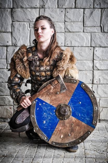 Premium Photo Shieldmaiden Cosplay Viking Girl A Woman With A Sword