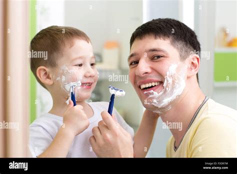 Playful Father And Son Shaving Together Bathroom Stock Photo Alamy