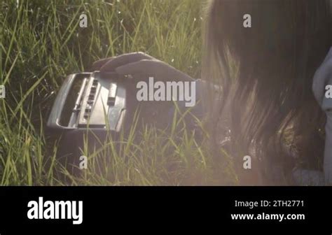 Woman Tuning The Dial On Fm Am Portable Radio Stock Video Footage Alamy