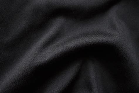 抽象的な黒い布布テクスチャ背景 プレミアム写真