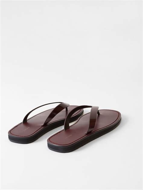 The Row Leather Flip Flops Black Editorialist