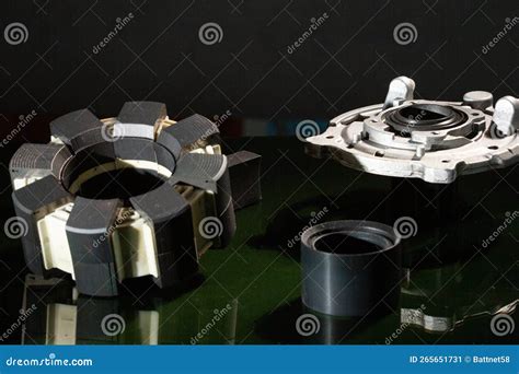 Details And Components Of The Stator Of The Refrigeration Unit On A Black Background Close Up