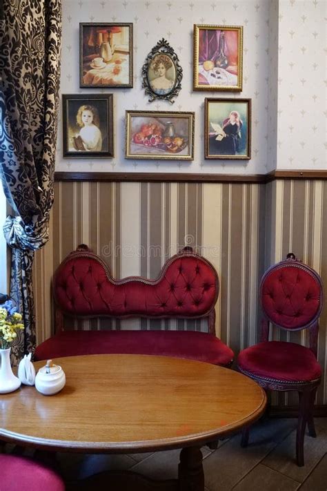Interior Of Cafe With Tables Chairs And Pictures Editorial Image