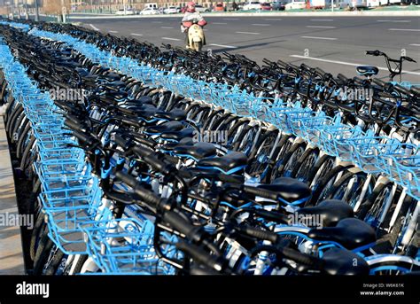 Bicycles Of Hellobike And Other Chinese Bike Sharing Services Are Lined