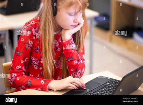 Girl In Classroom Using Laptops Stock Photo Alamy