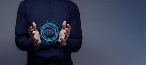 Premium Photo Businessman Holds A Hologram Of An Artificial Intelligence Brain