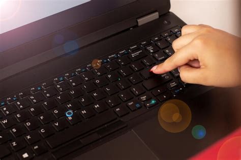Premium Photo Woman Clicking The Enter Button On A Laptop