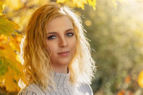 Portrait Of Attractive Blond Woman Posing Outdoors Stock Image Image