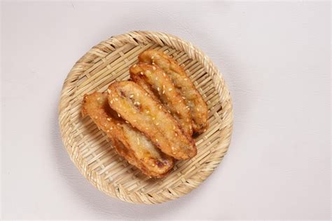 Premium Photo Kluay Kaek Is Thai Banana Fritters With Sesame Seed