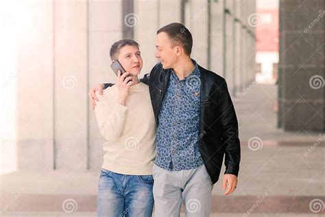 Cute Gay Couple In The City Tender Gentle Kissing Smiling Stock Image