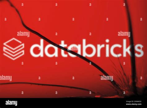 Databricks Logo Is Visible On The Broken Glass Databricks Inc Is A