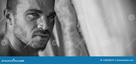 Handsome Caucasian Male Model Posing In Black And White Portrait Stock