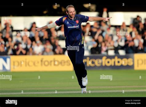 Paul Walter Of Essex Celebrates With His Team Mates After Taking The