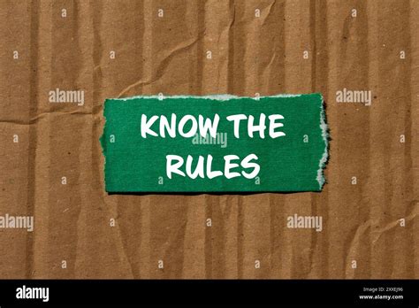 Know The Rules Message Written On Ripped Torn Green Paper Piece With Cardboard Background