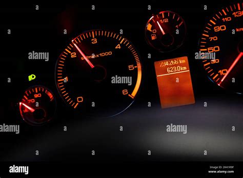 Red Car Tachometer In The Dark Symbol Of Speed Dashboard With Speedometer Tachometer