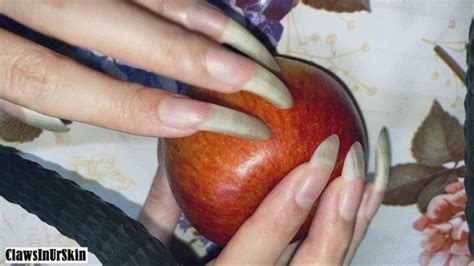 Clawing Poor Apple With Nails Clawsinurskin Clips4sale