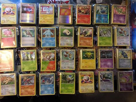 50 Pokemon Card Lot Guaranteed Holos And Rares Toys And Games