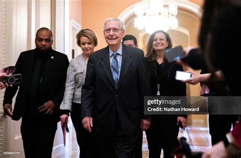 Senate Minority Leader Mitch Mcconnell Walks Into The Senate Chamber