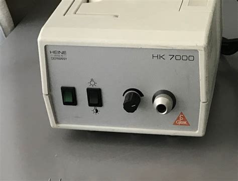 Налобный осветитель MD1000 F.D. Heine с бинокулярной лупой, источник ...