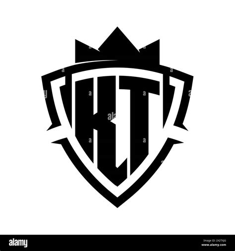 Kt Letter Bold Monogram With Triangle Curve Shield Shape With Crown