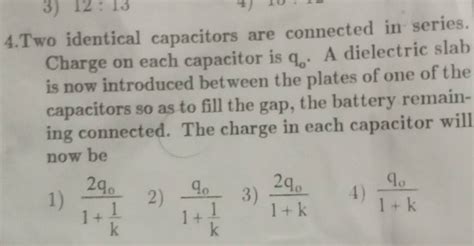 4two Identical Capacitors Are Connected In Series Charge On Each Capaci