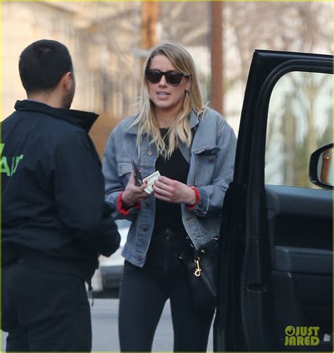 Amber Heard Is All Smiles In First Outing Since Finalizing Divorce