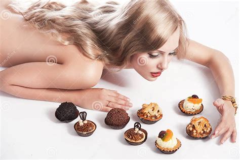 Blond Girl Eating Pastry She Looks Pastries Stock Image Image Of