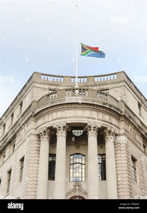 The National Flag Of South Africa Is At Half Mast In Tribute To Former