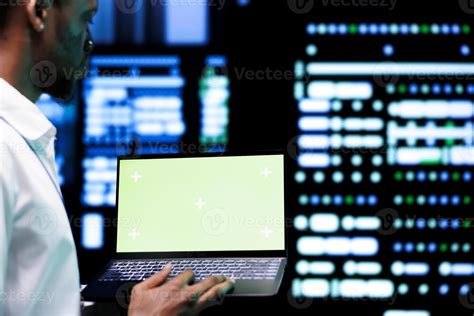 developer examining server rigs performance trends using chroma key device expert using green