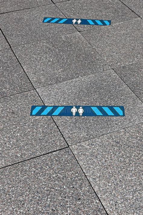 Blue Marking Indicating How Much Distance People Should Keep To Be Safe