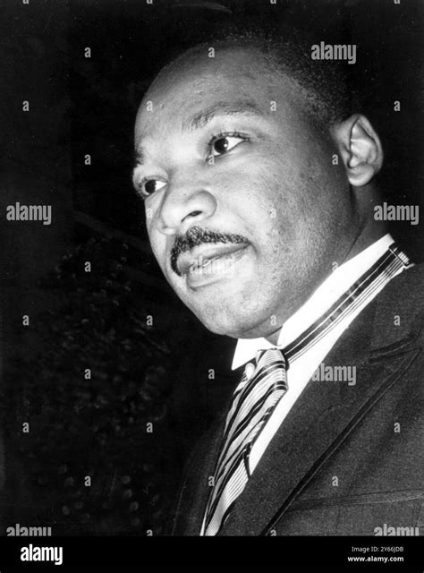 Civil Rights Leader Dr Martin Luther King Jr Holding The Nobel Peace