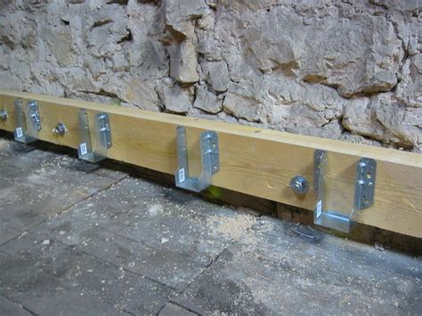 Comment Fixer Une Poutre En Bois Sur Un Mur Housekeeping Magazine