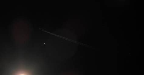 Moon Plane Jupiter Jupiters Moons Are Just Visible In This Shot