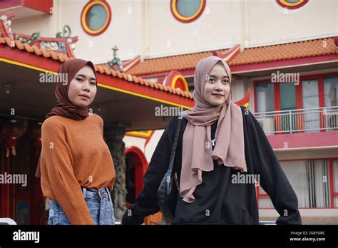 Two Beautiful Moslem Girls With A Natural Background The Girls