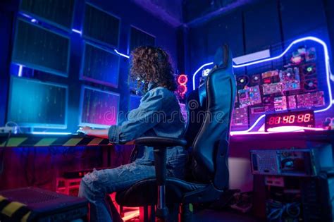 Asian Woman Programmer Is Working In Her Computer Room Futuristic
