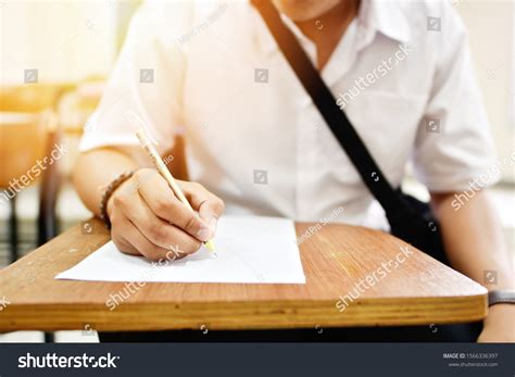 Babe Using Pen Write Writing Classroom Stock Photo Edit Now 1566336397