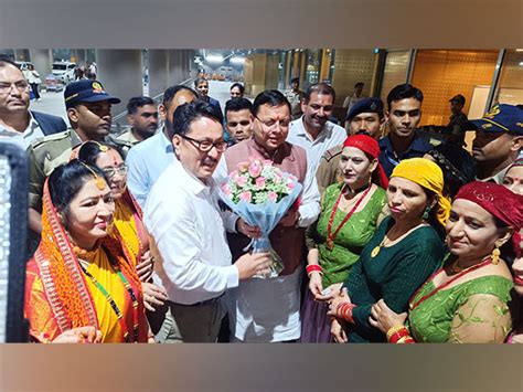 Cm Pushkar Singh Dhami Reaches Mumbais For Road Show Following