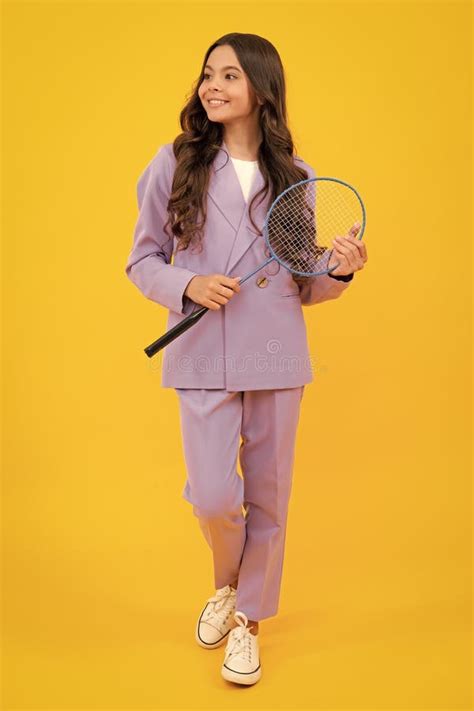 Teen Girl Badminton Player In Suit With Badminton Racket Isolated On