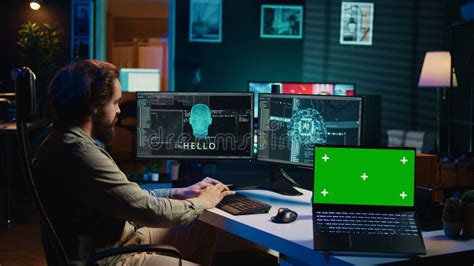 Engineer With Eeg Headset On Merging With Ai Green Screen Laptop Stock