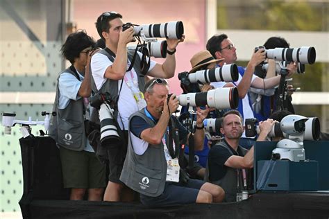 Even The 2024 Olympics Photographers Are Dripped Out