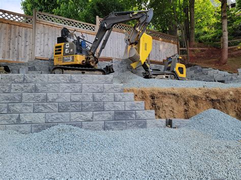 Stacking The Retaining Wall Block And Backfilling The Wall