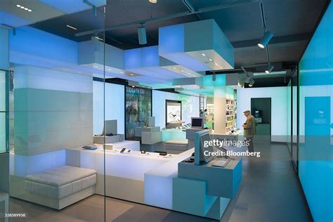 A Customer Browses Inside A Royal Kpn Nv Mobile Phone Store In News