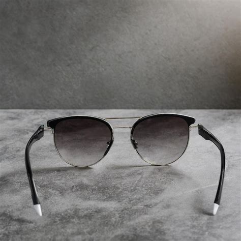 Premium Photo A Pair Of Sunglasses With A Pair Of Silver Frames