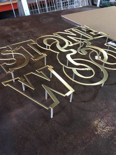 Custom Laser Cut Outs In Stainless Steel Acrylic And Timber Premier