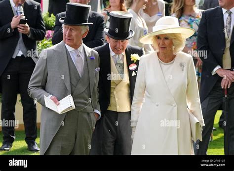 King Charles Iii Left And Queen Camilla Right With Royal Advisor To