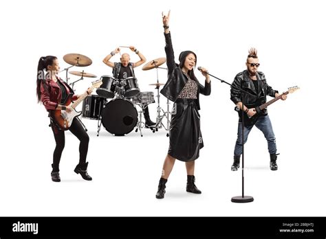 Female Singer Male And Female Guitar Players And A Drummer In A Band